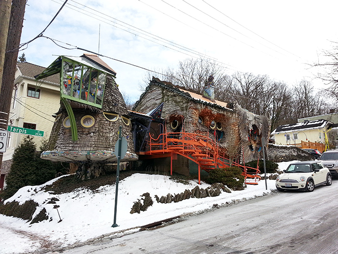Even in winter, the Mushroom House maintains its charm, the orange walkways providing a warm contrast against the snowy Cincinnati landscape.