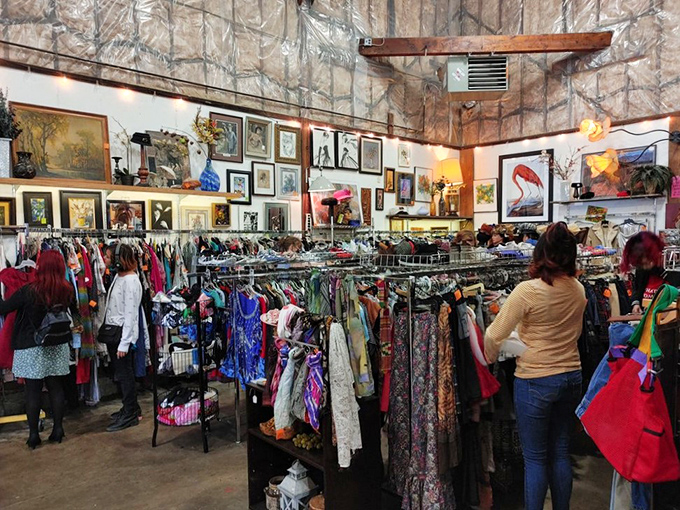 The clothing section reveals fashion's cyclical nature. Those formal dresses overhead are just waiting for their second prom night.