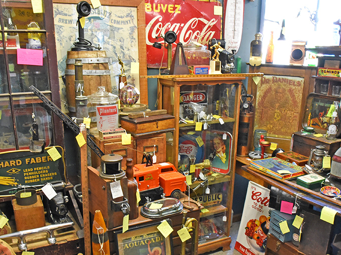 Nostalgia merchants have arranged this booth like a time capsule, where vintage Coca-Cola meets wooden crates in perfect harmony.