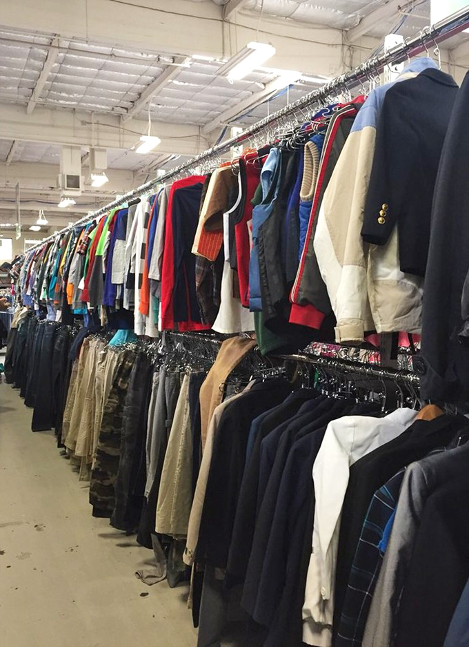 The men's clothing section stretches toward infinity. A sartorial time machine where yesterday's fashion faux pas become tomorrow's ironic statement pieces.