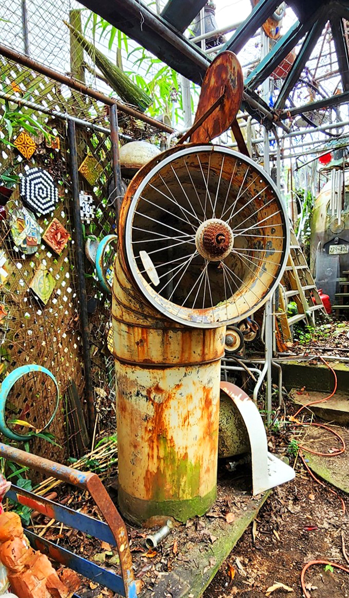 This rusty cylinder topped with a bicycle wheel somehow manages to look both post-apocalyptic and whimsically poetic at the same time.