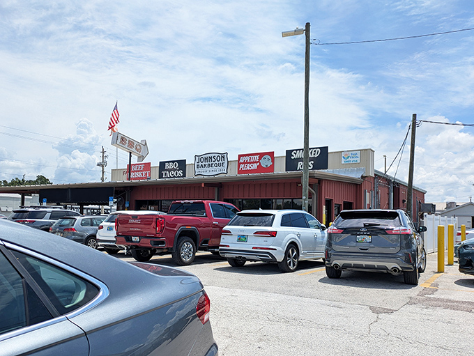 The packed parking lot tells you everything you need to know. In barbecue math, full lot equals empty plates.