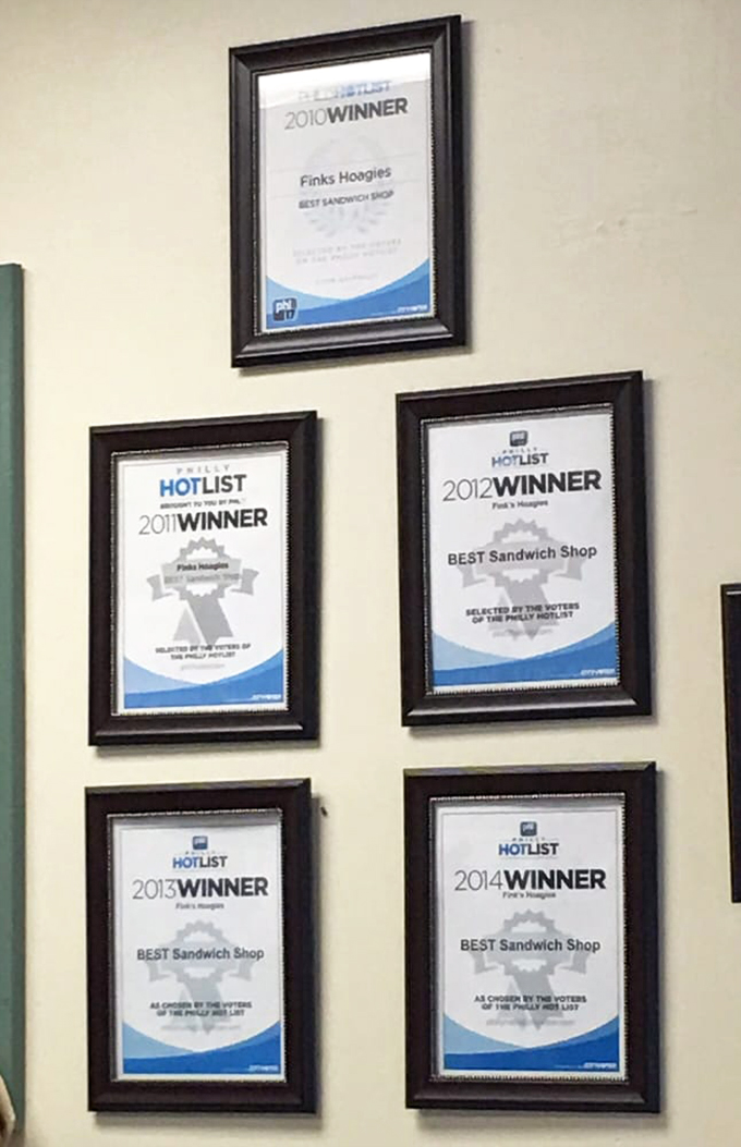 The wall of awards isn't just decoration&mdash;it's a timeline of sandwich excellence that spans years of consistent quality and dedication to the craft.