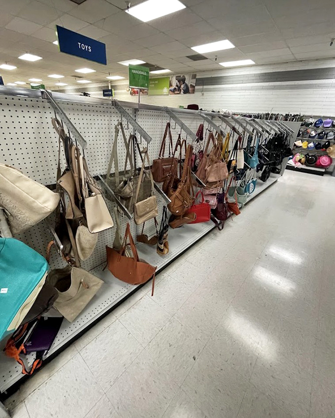 Handbag heaven! Designer lookalikes and genuine leather finds hang side by side, waiting for their next shoulder to grace.
