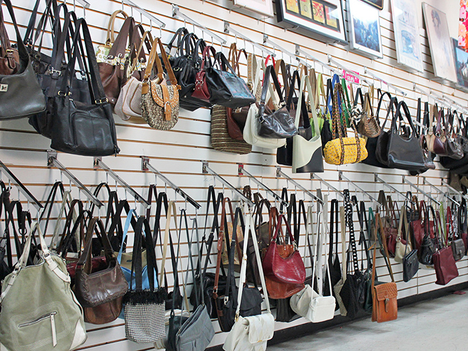 Handbags hang like a designer boutique display, proving style doesn't require breaking the bank account completely.