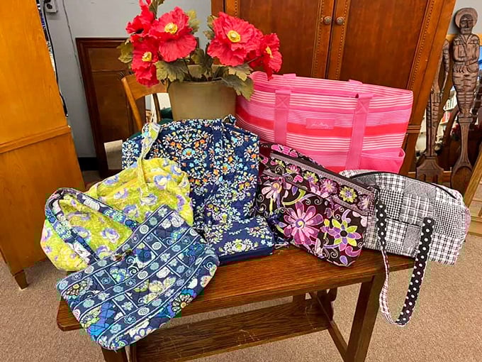 Colorful totes and handbags lounge together like old friends at a reunion, each with stories to tell and places to go.