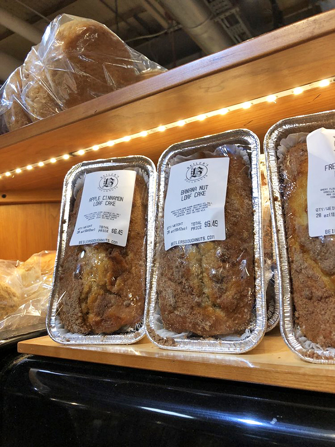 Banana nut loaf cakes lined up like soldiers in a delicious army. These humble treasures prove that not all heroes wear glazes.