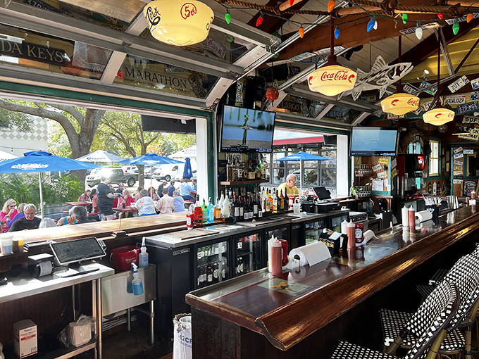The bar area invites lingering conversations over cold drinks and even warmer hospitality from the staff.