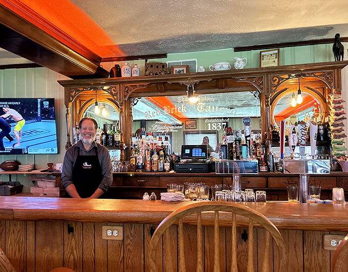 Behind every great historic tavern is a bar that knows its business. This wooden beauty has probably heard more stories than a small-town librarian.