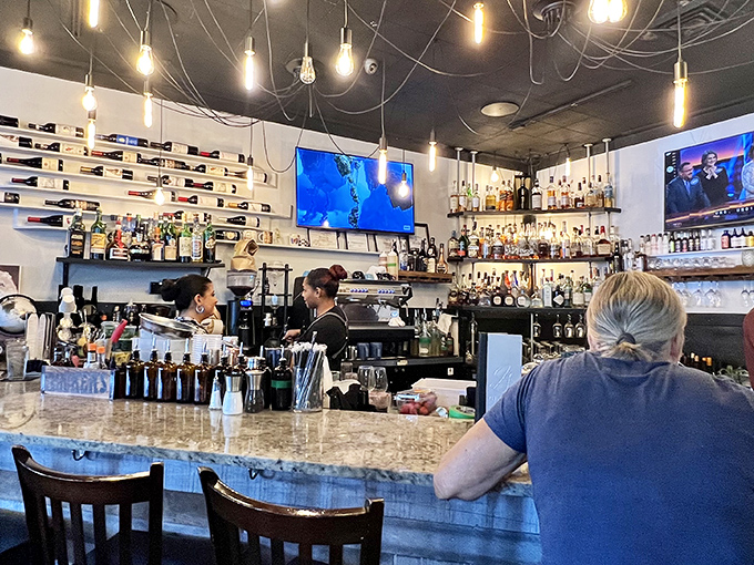 The bar isn't just where drinks are made &ndash; it's command central for liquid happiness, where bottles stand at attention waiting for their moment to shine.