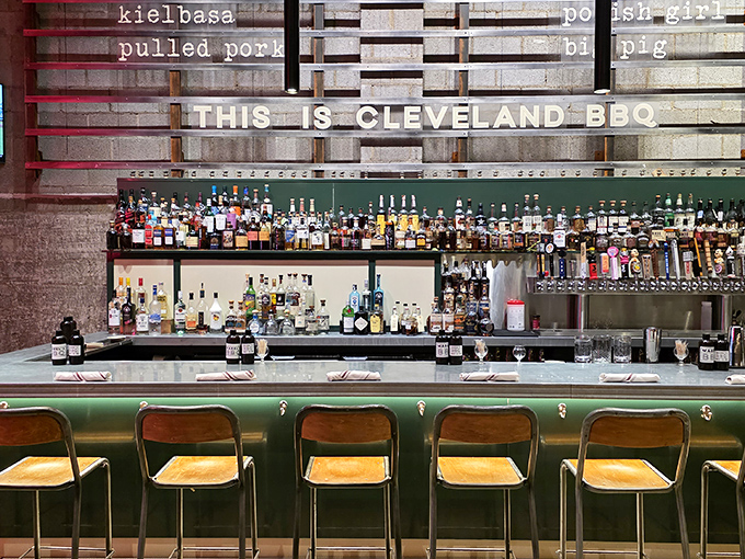 Behind that bar lies liquid courage for those about to tackle the Giant Beef Rib. "THIS IS CLEVELAND BBQ" isn't just signage&mdash;it's a declaration.