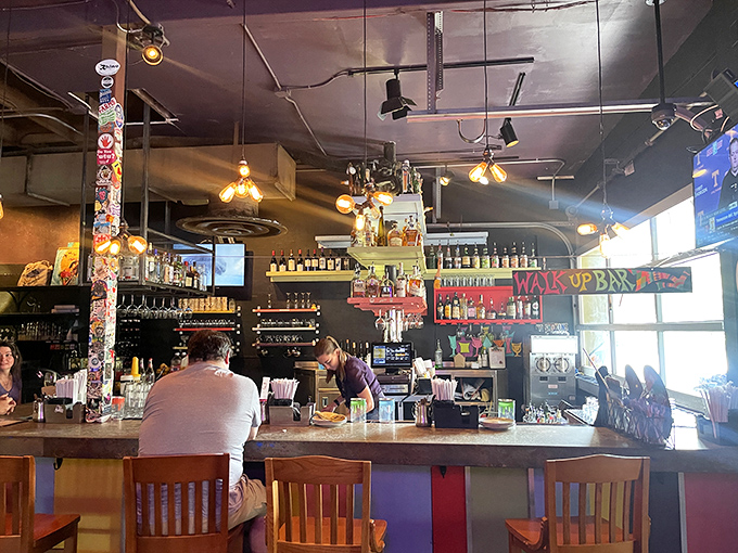 The bar isn't just serving drinks&mdash;it's creating liquid art in a space where even the stickers and bottles become part of the masterpiece.