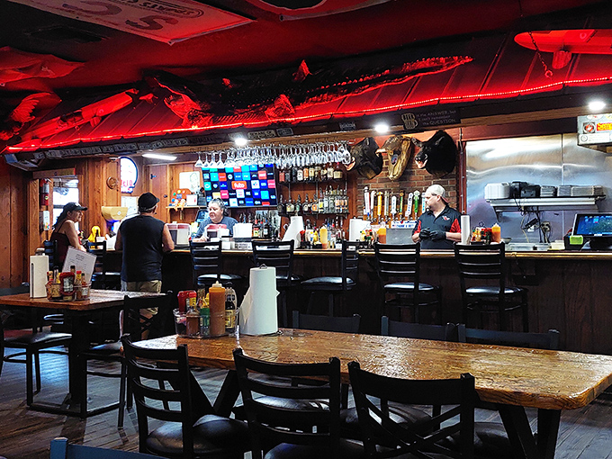 The bar area serves as command central &ndash; where orders fly, stories flow, and the bartenders remember your usual before you've fully settled onto your stool.