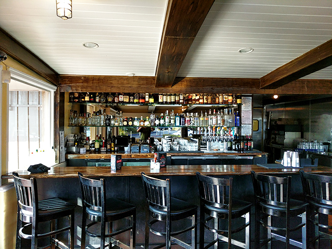 The bar's wooden beams and impressive bottle display suggest they take their liquid refreshments as seriously as their seafood specialties.