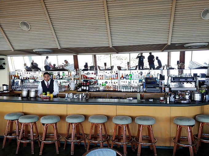 The bar doesn't need flashy gimmicks when it's serving classics with a side of "that view could make a glass of water taste spectacular."