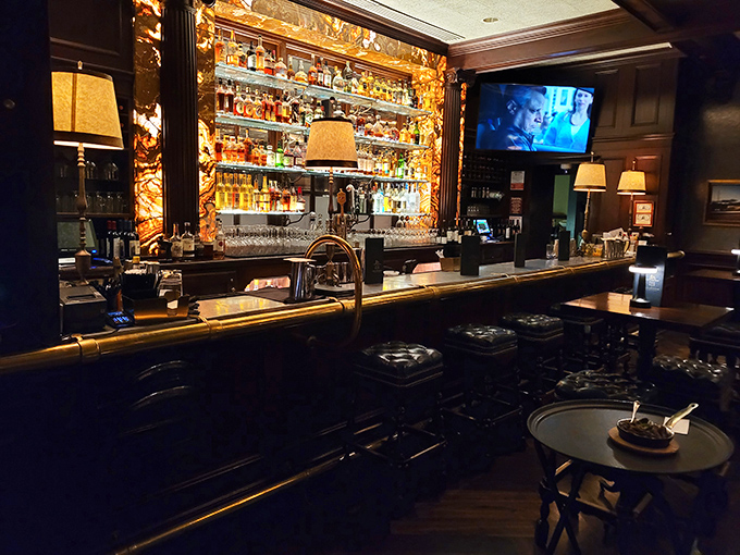 The bar at Lawry's glows with amber promise. That backlit display of spirits isn't just inventory&mdash;it's a gallery of liquid possibilities.