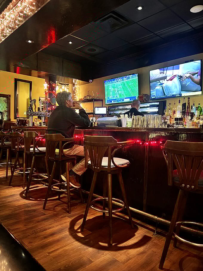 The bar scene offers front-row seats to both mixology magic and whatever game is on&mdash;proving that sometimes the best dining companions are strangers with excellent taste in bourbon.