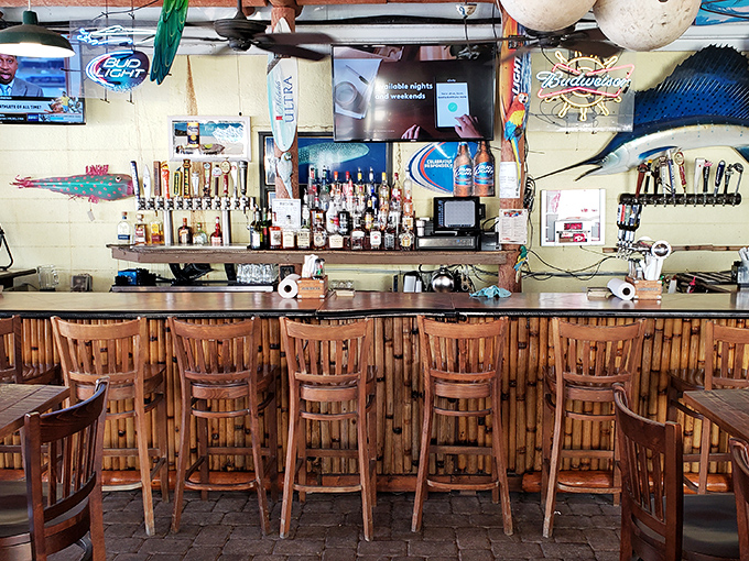 The bar's bamboo accents and tiki touches remind you that yes, you're definitely in paradise now.