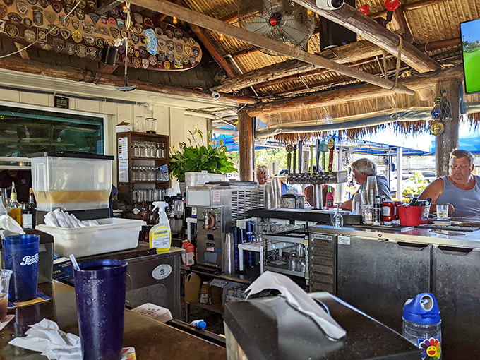 The bar area beckons with promises of perfectly crafted cocktails and the kind of atmosphere that encourages storytelling.
