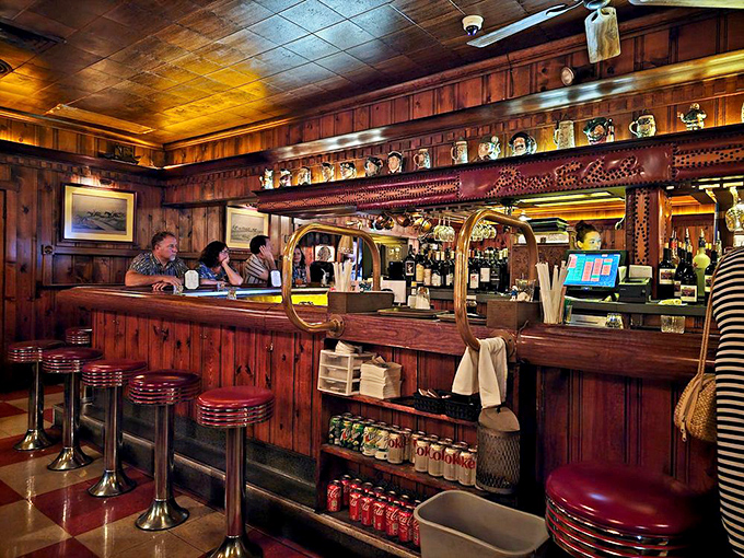 A bar built for serious drinking and serious eating, where bartenders measure pours by eye and memory, not with digital jiggers.