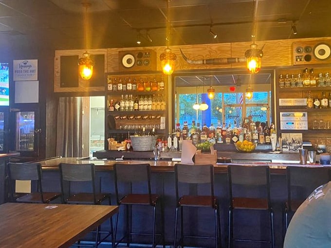 The well-stocked bar promises liquid refreshment that pairs perfectly with whatever burger masterpiece you've ordered.