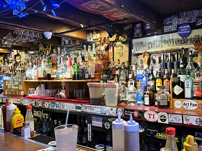 The bar isn't just stocked&mdash;it's an arsenal of liquid courage needed to face down The Thurmanator. Dollar bills and stickers mark the territory of past warriors.