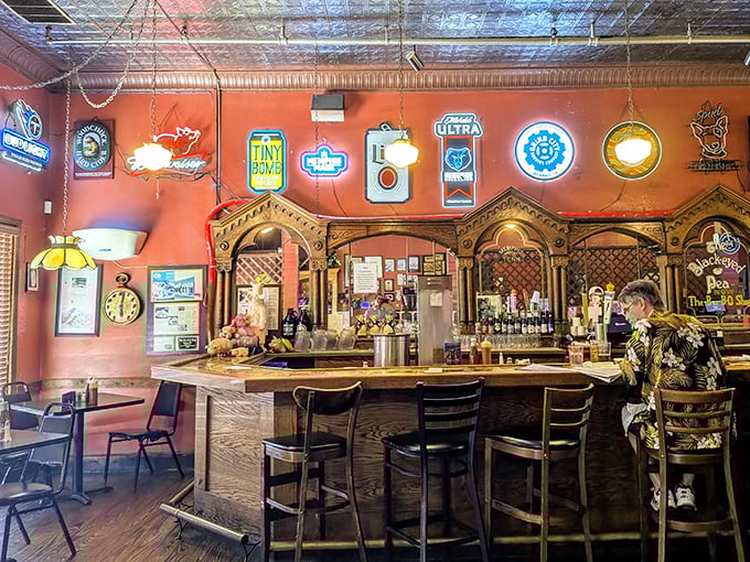 The bar area where strangers become friends, united by their mutual appreciation for Memphis' smoky treasures.