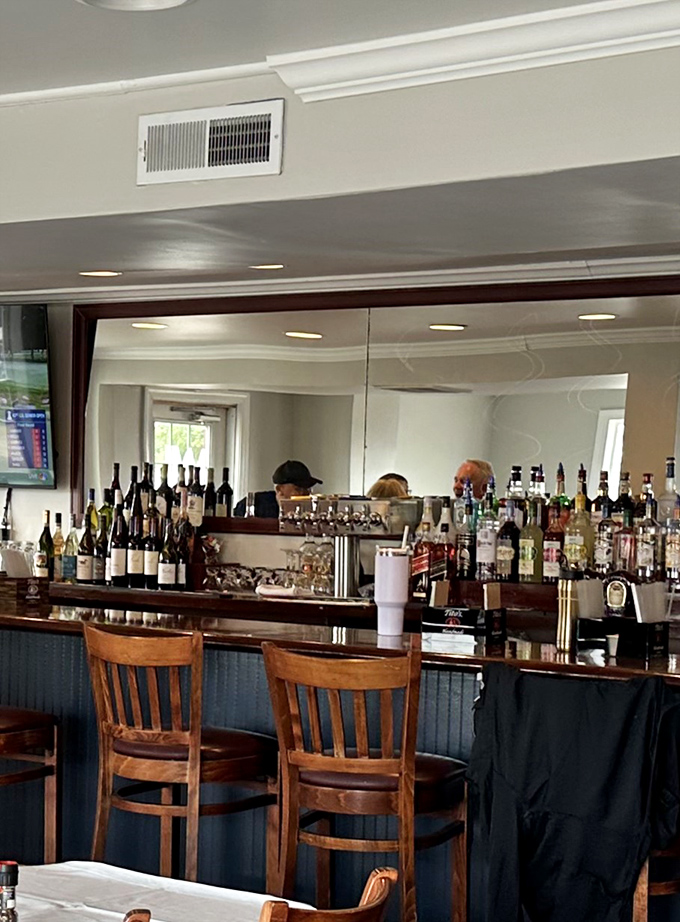 The bar at Waterman's isn't just serving drinks&mdash;it's dispensing liquid courage for those about to battle mountains of crab legs.