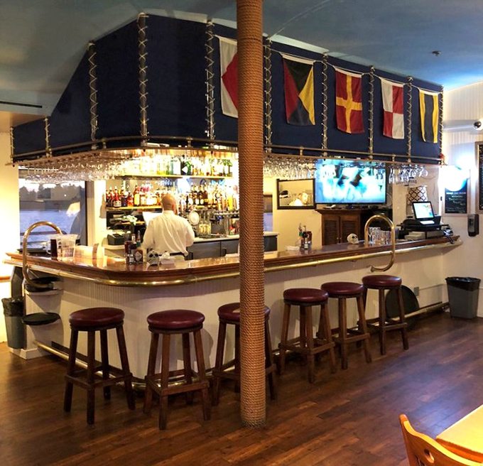 That nautical bar looks like it sailed straight out of a Hemingway novel, minus the drama.