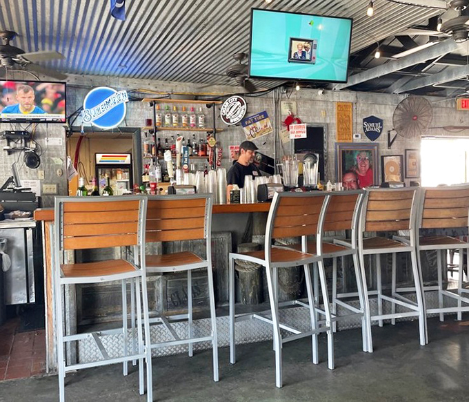 A bar that promises cold beer, strong drinks, and the kind of conversations that make vacation stories worth telling back home.