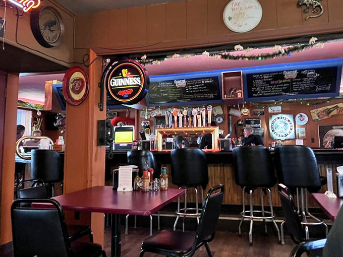 The bar area beckons with Guinness signs and the promise of cold drafts. Where barbecue pilgrims gather to compare smoke ring notes and sauce preferences.