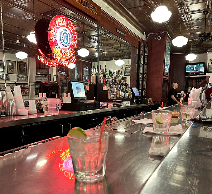 The bar area welcomes guests with celebrity photos and maritime charm that celebrates Pittsburgh's waterfront heritage.