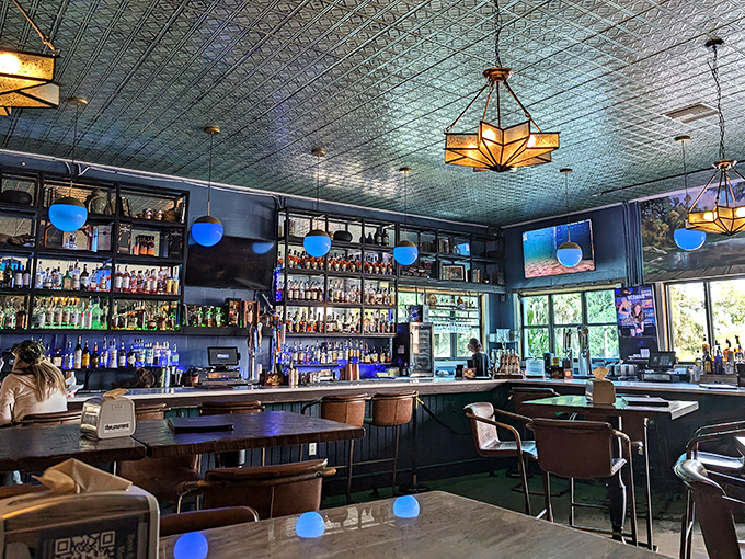 The Basin bar doesn't just serve drinks—it creates liquid memories under a ceiling that deserves its own architectural award.