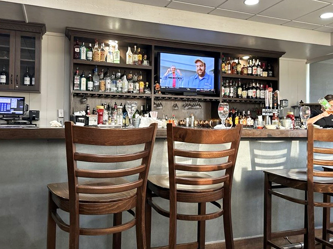 A well-stocked bar where stories flow as freely as the drinks. The kind of place where bartenders remember your name and your order after just two visits.