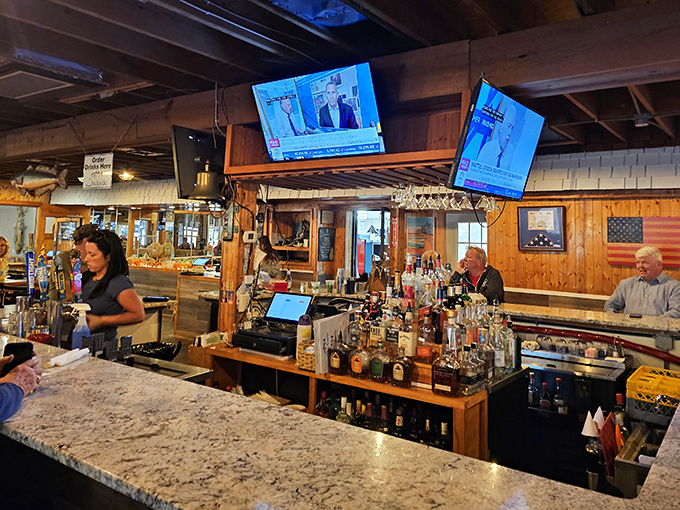 The bar area – where fishing stories grow taller with each round, and nobody minds one bit.