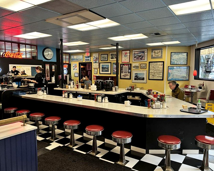 The counter where breakfast dreams come true. Those red stools have supported generations of Seattleites seeking coffee refills and life-changing hash browns.