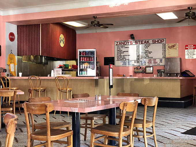 The counter view offers dinner and a show&mdash;watch sandwich artistry in action as orders are called and culinary magic unfolds.