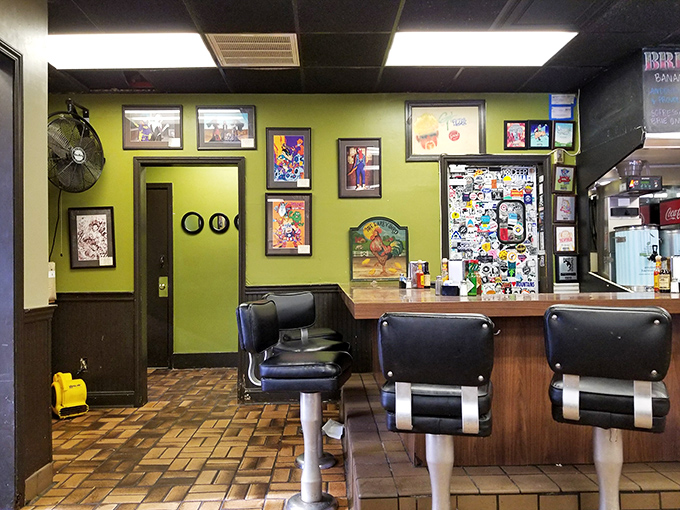 The lime green wall pops against vintage counter seating, creating a space that's both retro and refreshingly current. Diners aren't just preserved here&mdash;they're reimagined.