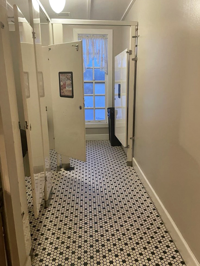 The restroom hallway's vintage tile floor&mdash;because at Loveless, even the walk to wash your hands is steeped in nostalgic charm.