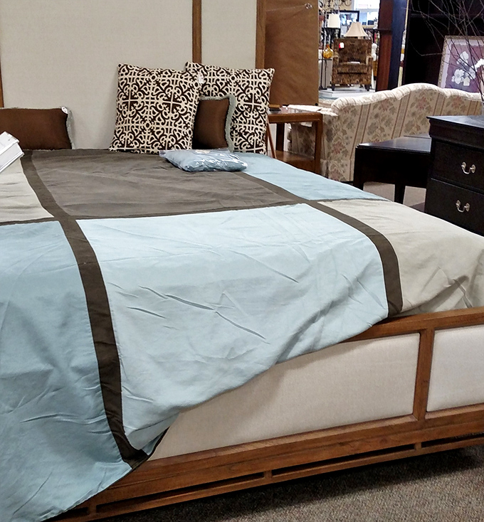 A bed that's seen more sweet dreams than nightmares, ready for its next chapter in someone else's bedroom story.