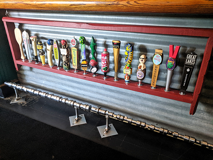 Beer taps lined up like soldiers ready for duty. Each handle tells a story of craft and tradition&mdash;liquid art waiting to be poured.