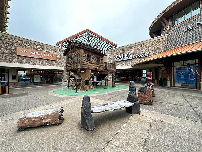 Wooden benches and thoughtful landscaping create peaceful islands amid the shopping storm. Even dedicated bargain hunters need occasional moments of retail respite.