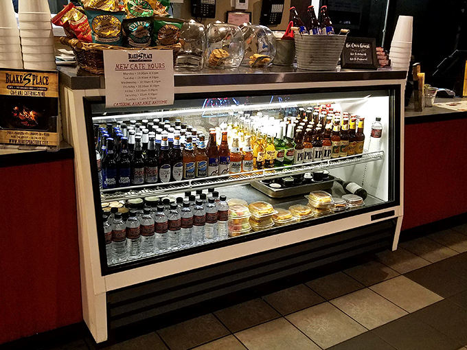 The beverage case: where decisions about beer pairings are made with the same gravity as the earlier meat selections.