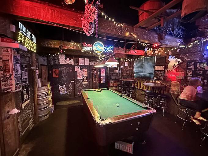 The green felt battlefield where friendships are tested and strangers become friends while waiting for their chicken orders.