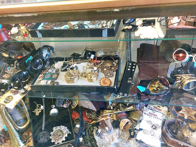 Vintage treasures glimmer under glass, whispering stories of decades past. That pocket watch might have timed someone's wedding day speech in 1962.