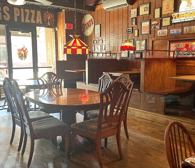 The walls adorned with memorabilia tell stories of good times past, while the tables stand ready for memories yet to be made.