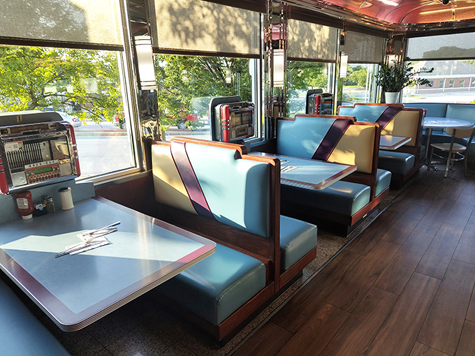 Classic diner booths offer front-row seats to breakfast theater where every meal becomes a memorable performance piece.