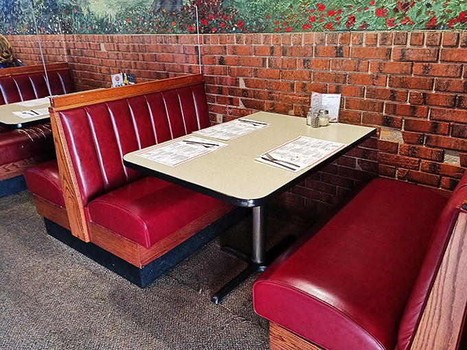 These classic red vinyl booths have witnessed countless first dates, family celebrations, and regular Tuesday night dinners&mdash;each one a potential chapter in Akron's social history.