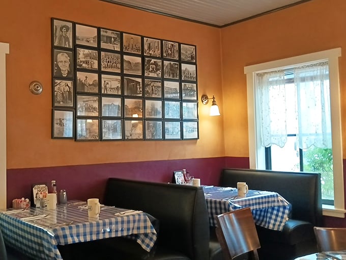Cozy booths invite intimate conversations over coffee refills. The wall of black and white photographs serves as a time machine to Moab's colorful past.