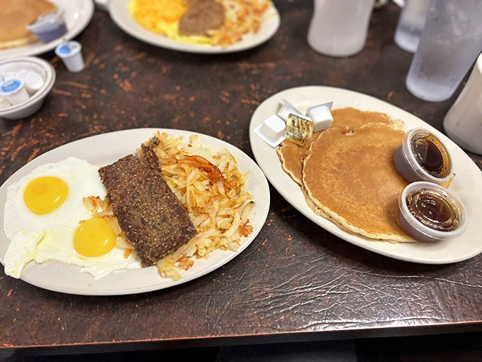 The classic American breakfast trinity&mdash;eggs, meat, and pancakes&mdash;executed with the confidence that comes from decades of practice.
